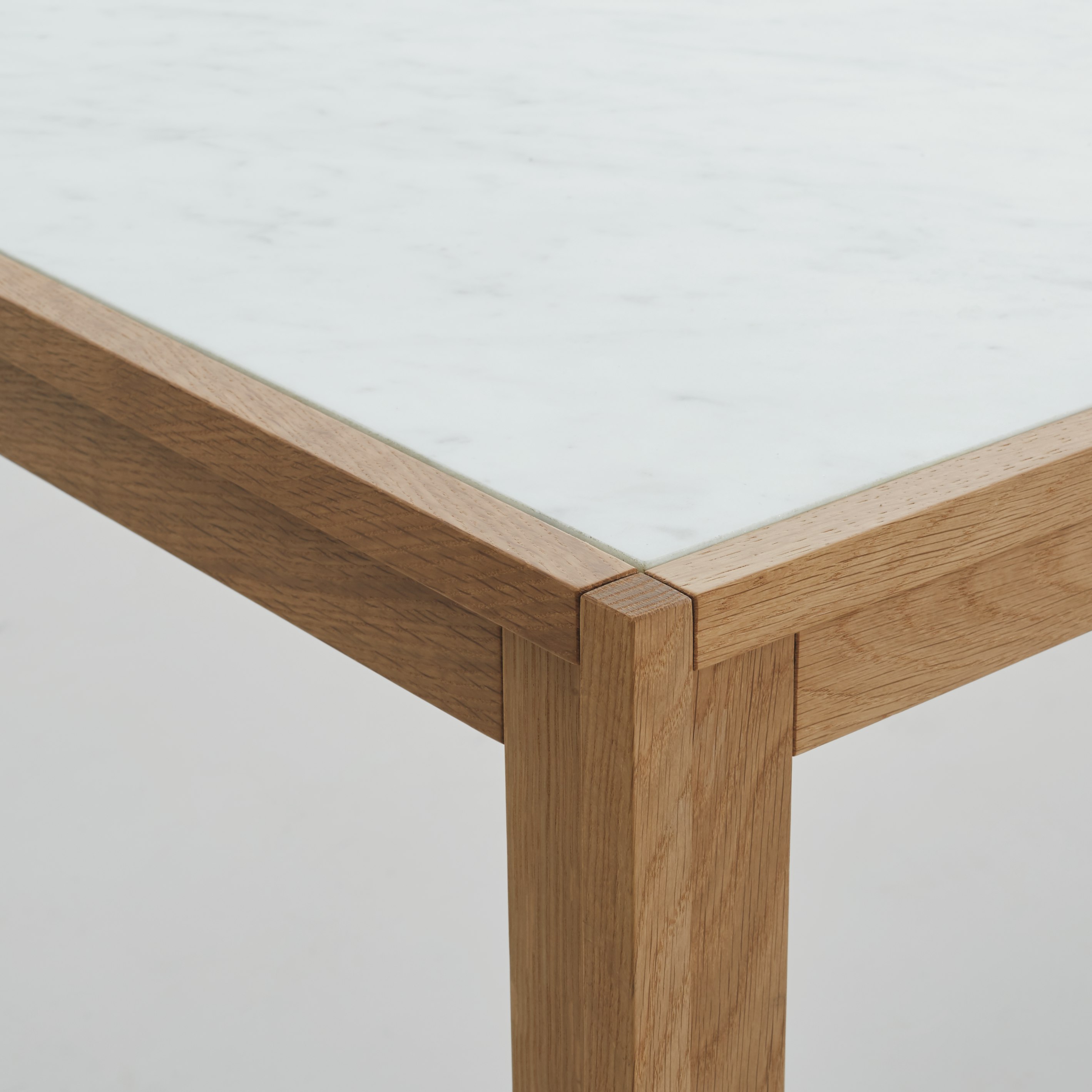 Doubleframe Table, Carrara Top – Design Within Reach